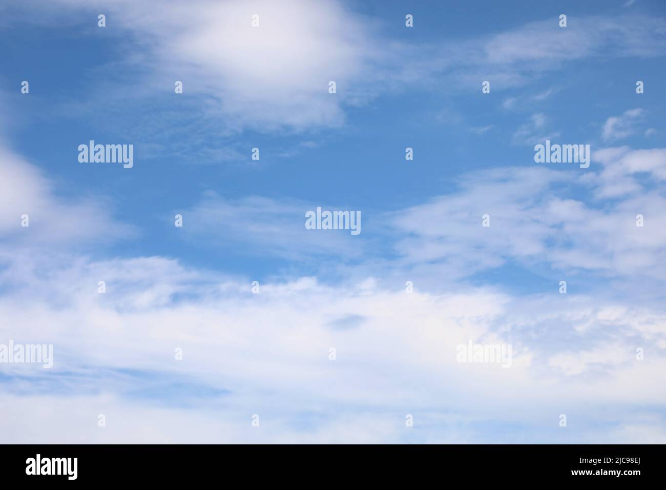 wide blue sky with high clouds in spring without animals or people ...