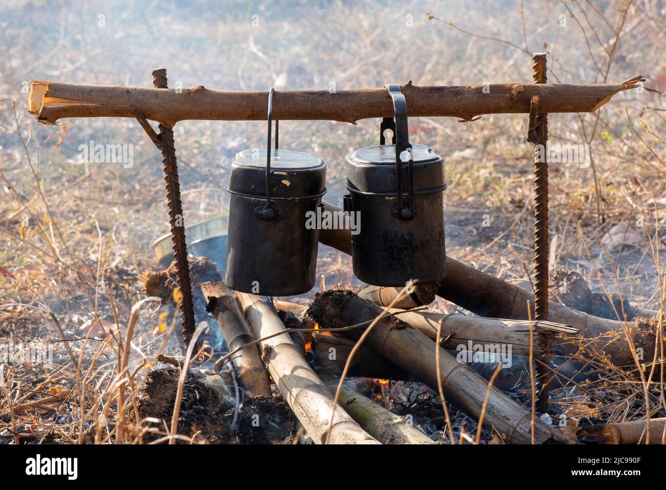 Camping and cooking food on vacation of children in rural areas Stock ...