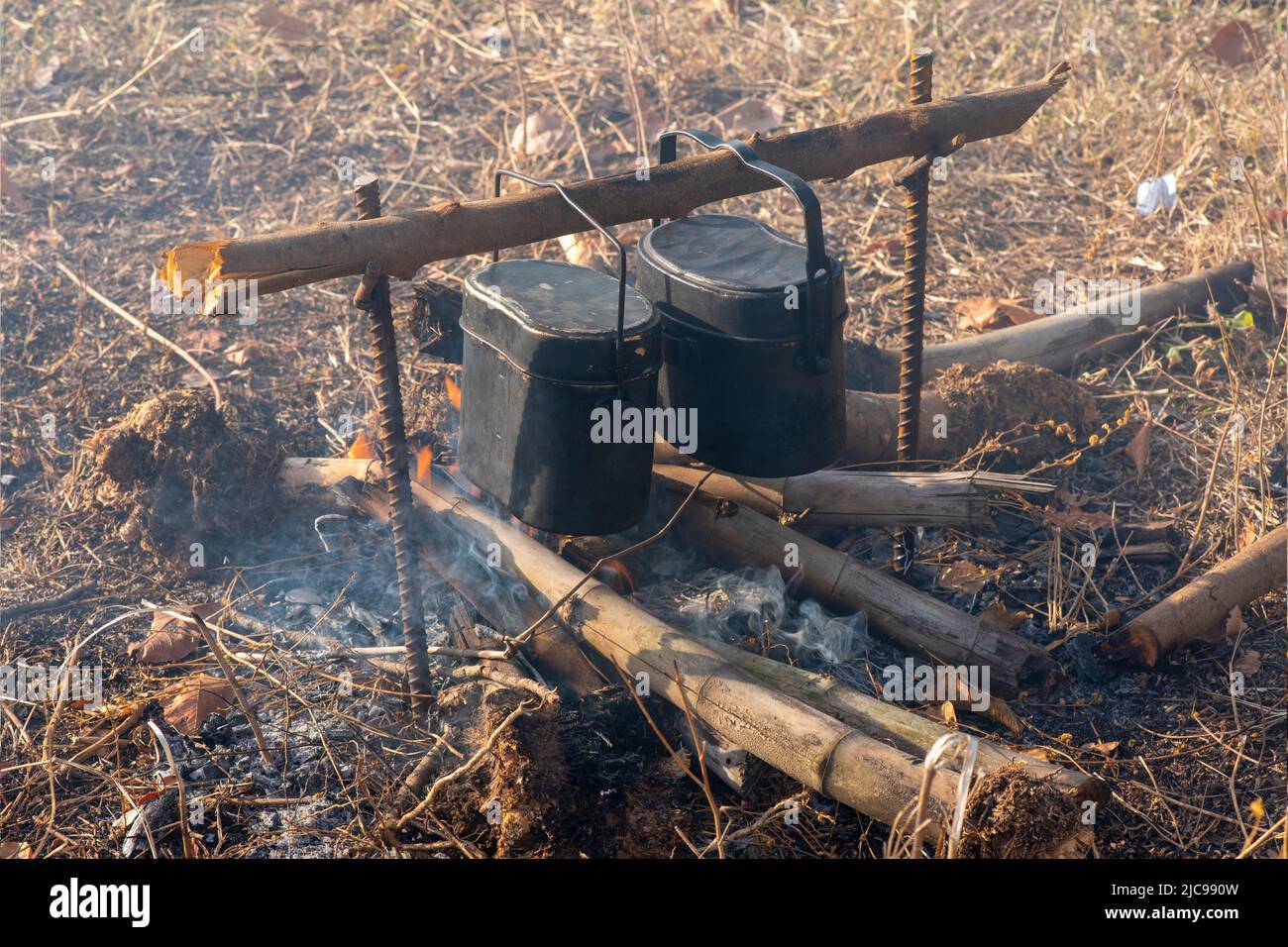 Camping and cooking food on vacation of children in rural areas Stock ...