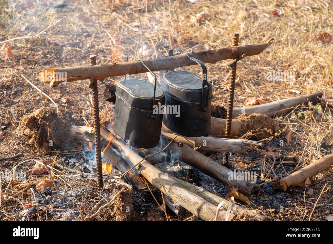 Camping and cooking food on vacation of children in rural areas Stock ...