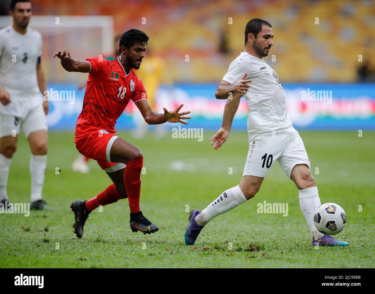Md Rimon Hossain (L) of Bangladesh and Tagayev Elman (R) of ...
