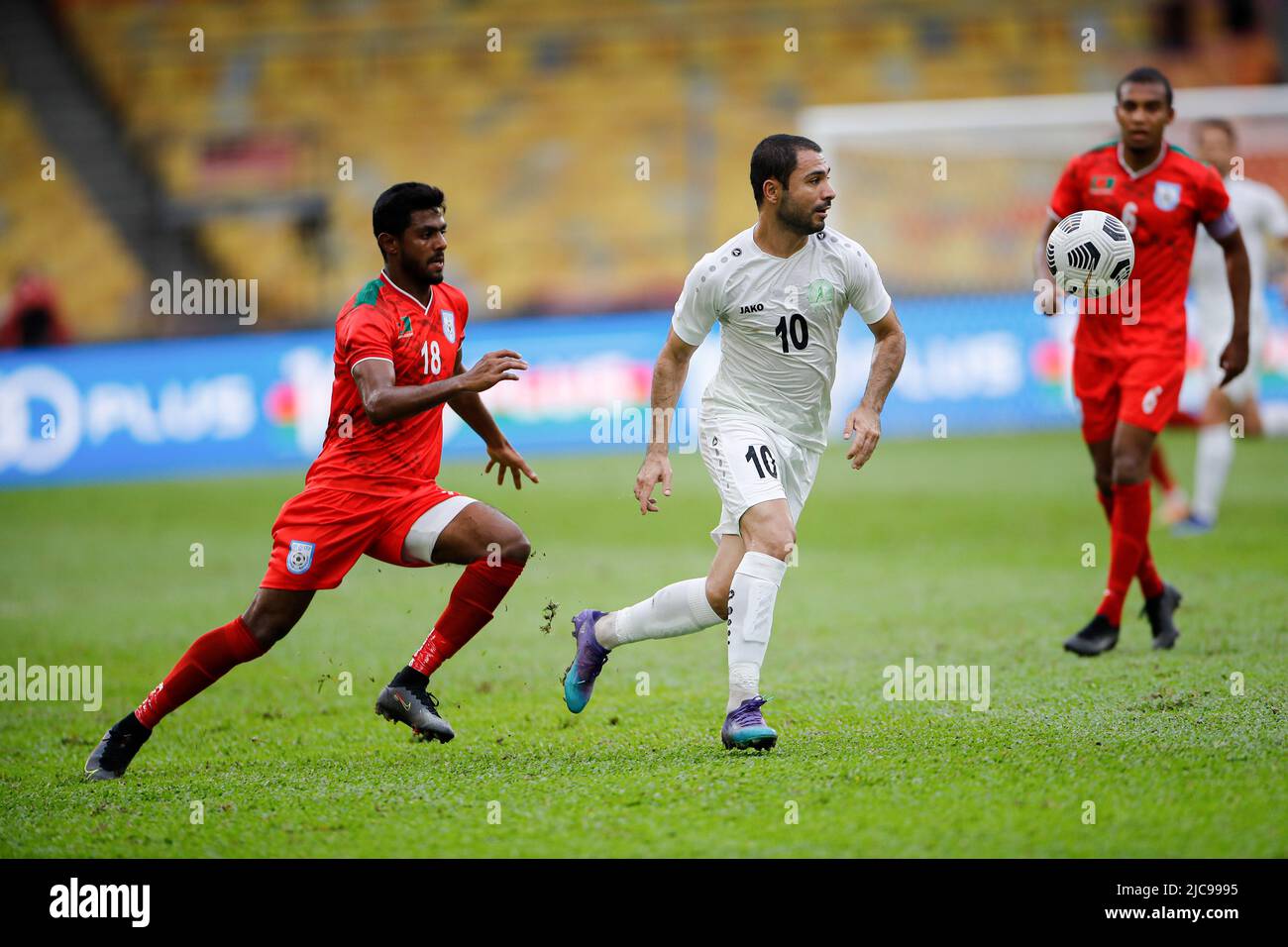 Md Rimon Hossain (L) of Bangladesh and Tagayev Elman (C) of ...