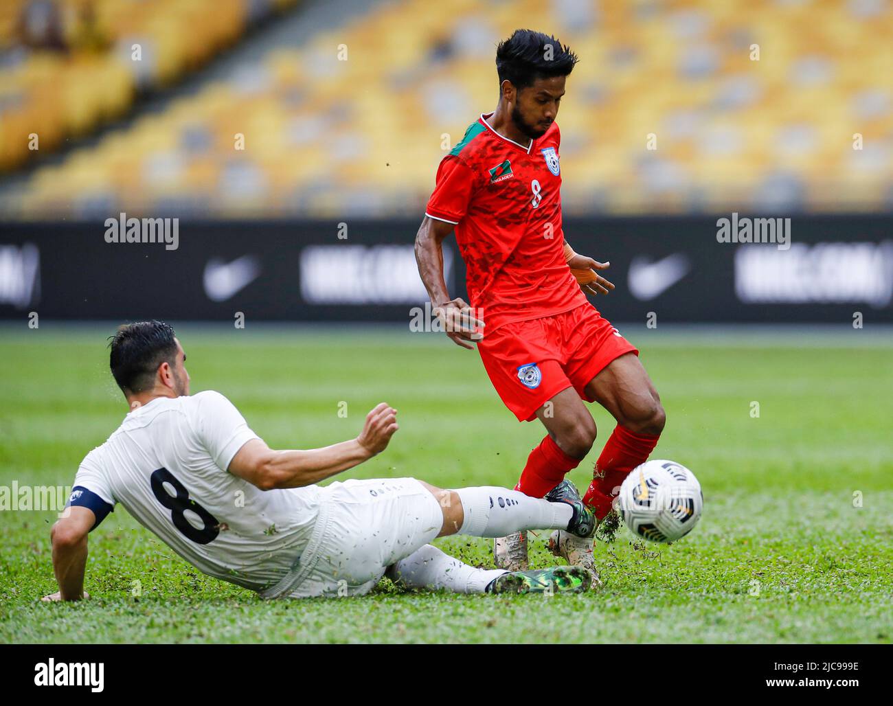 Atayev Ahmet (L) of Turkmenistan and Biplo Ahmed (R) of Bangladesh seen ...