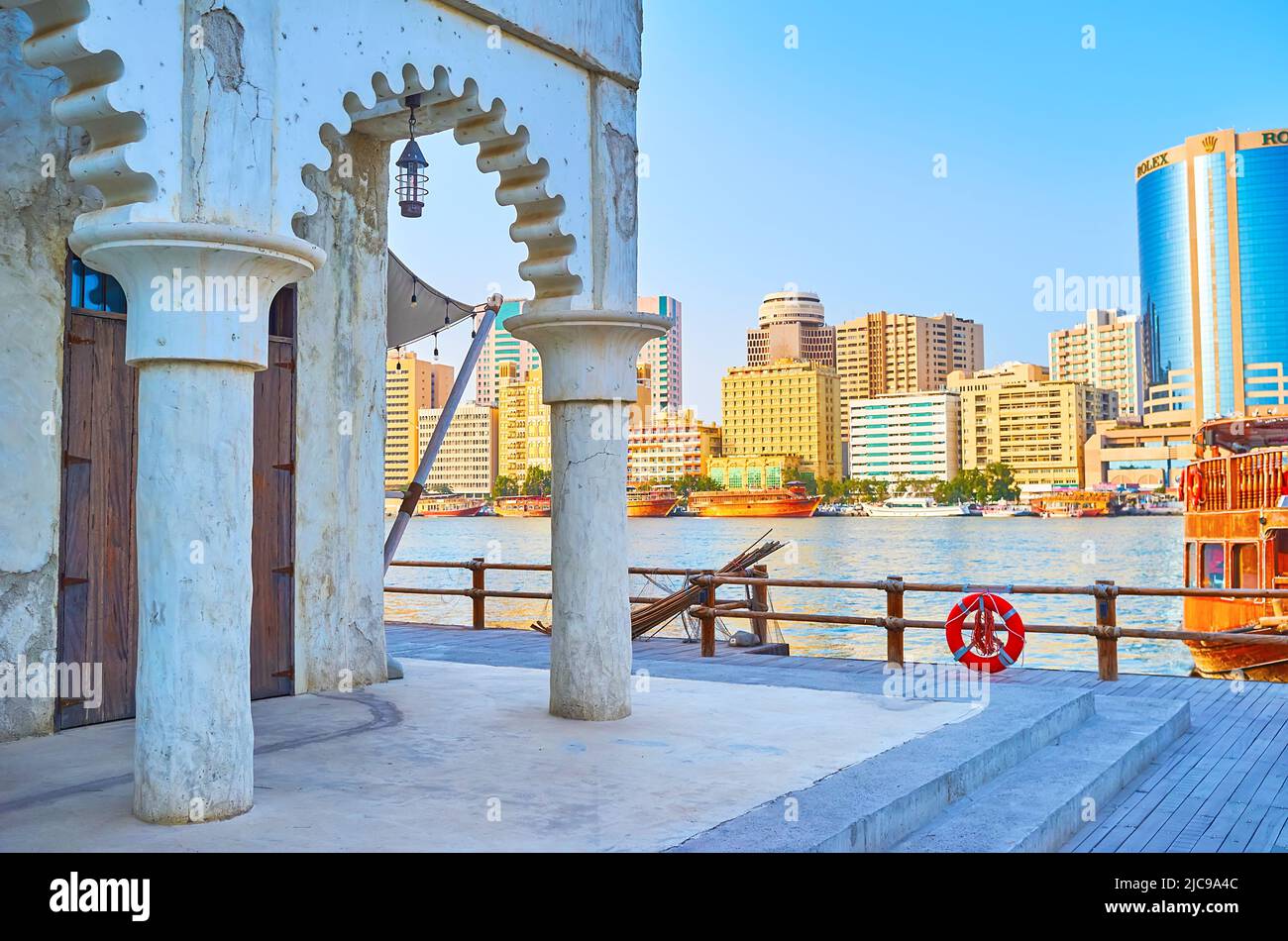 DUBAI, UAE - MARCH 1, 2020: Dubai Creek between the old Al Seef neighborhood with traditional ...