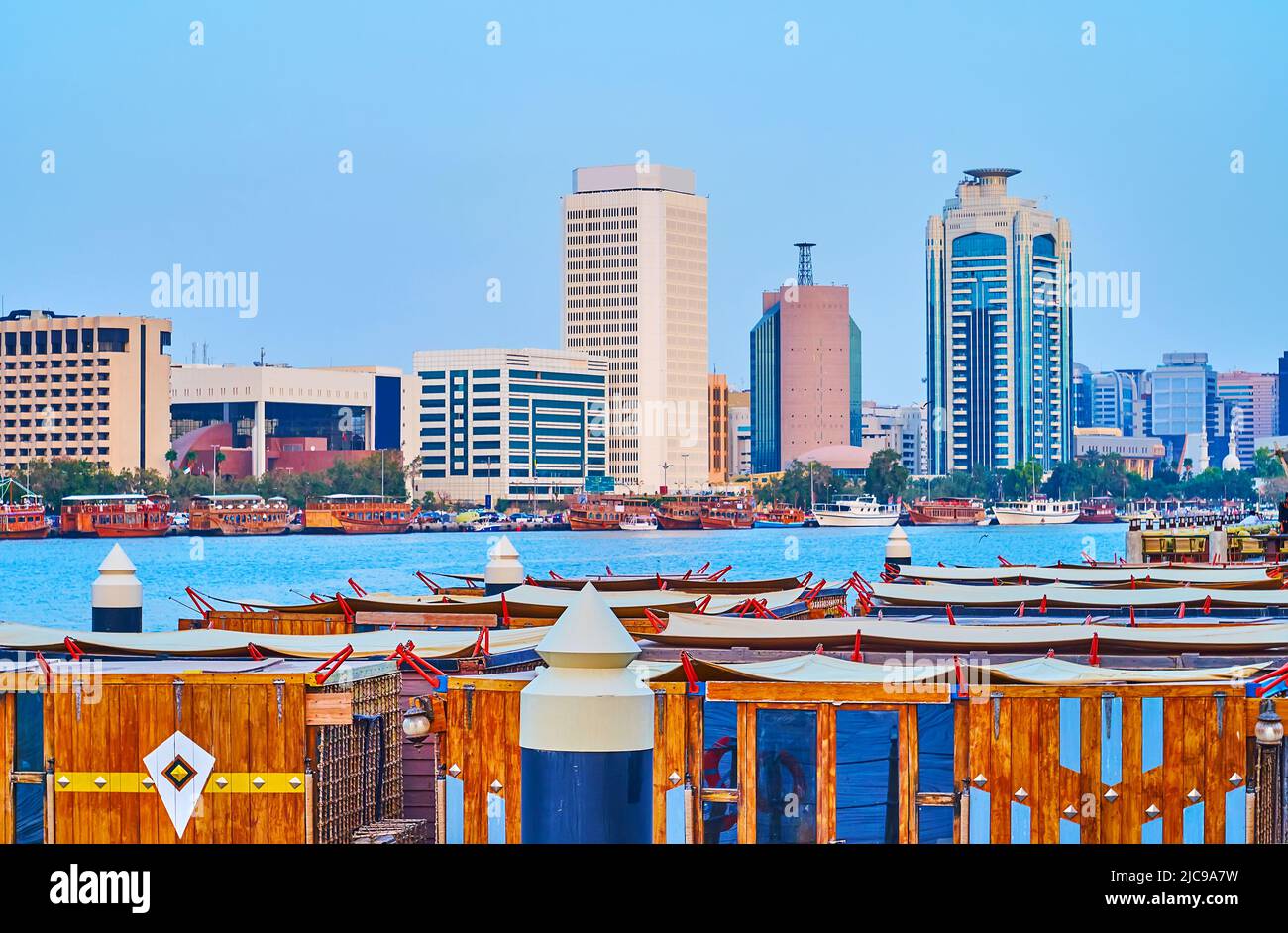 Modern architecture of Deira behind the house boats of Floating Market ...