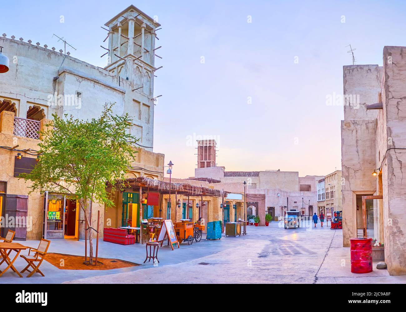 Enjoy the evening walk down the narrow street of Al Seef neighborhood ...
