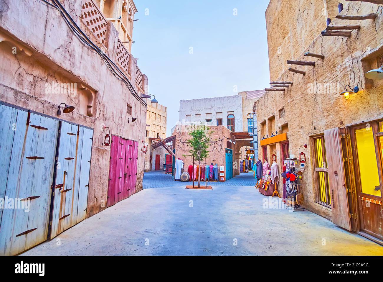 The small tourist shops in traditional adobe houses of Al Seef, Dubai ...