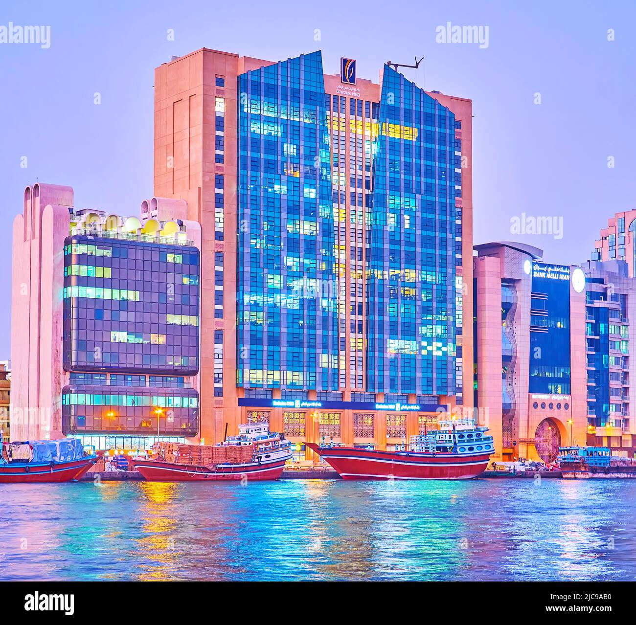 High rise building building with bright lights hi-res stock photography ...