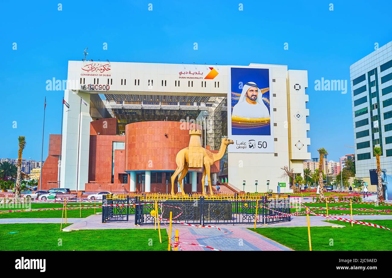 DUBAI, UAE - MARCH 1, 2020: The Camel statue and Dubai Municipality ...