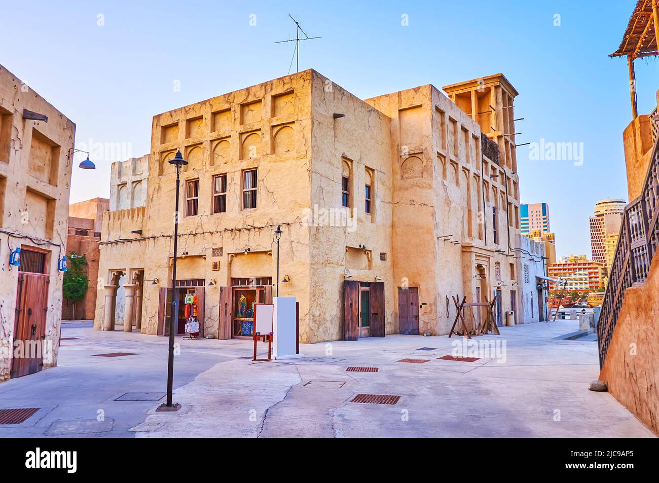 Adobe houses of old Al Seef neighborhood function like tourist stores ...