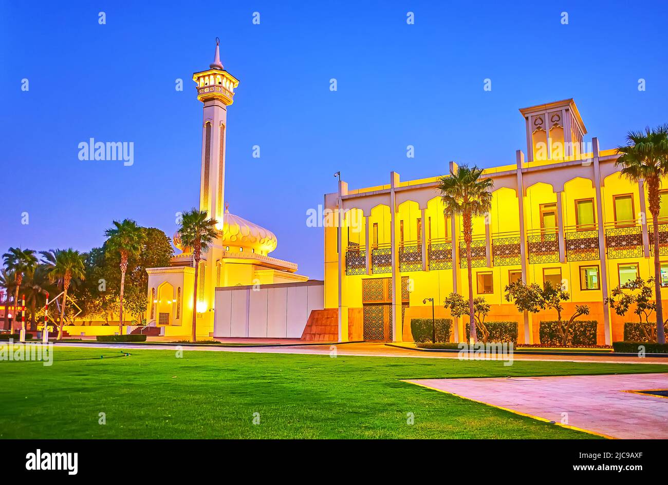 The modern beautiful building of Ruler's Court and its Mosque with tall ...