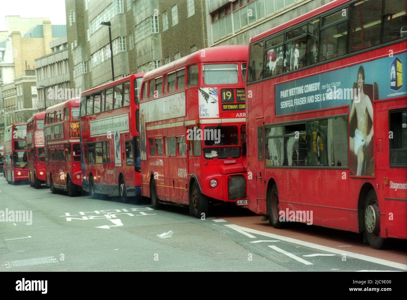 London red double-decker buses parked in a queue Stock Photo - Alamy