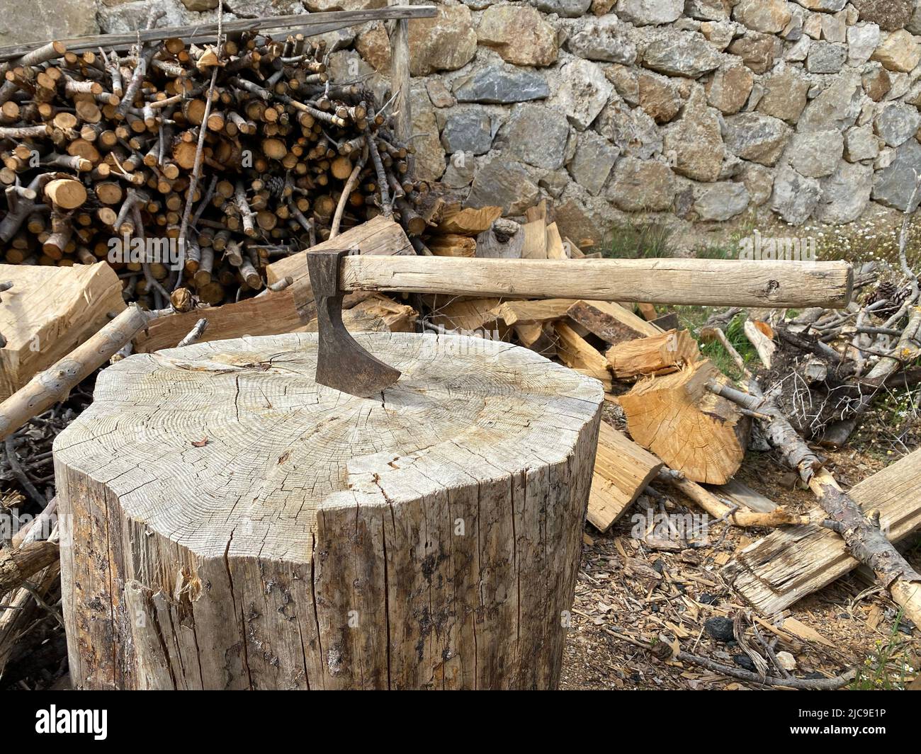 Axe cut in the chopping block. preparing for winter concept. firewood ...