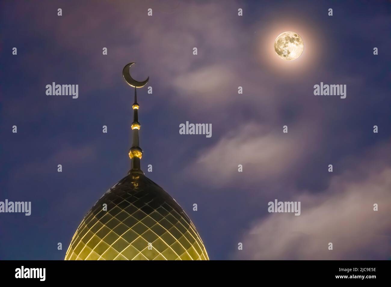 A Muslim dome with a crescent moon on the mosque. Minaret on the ...