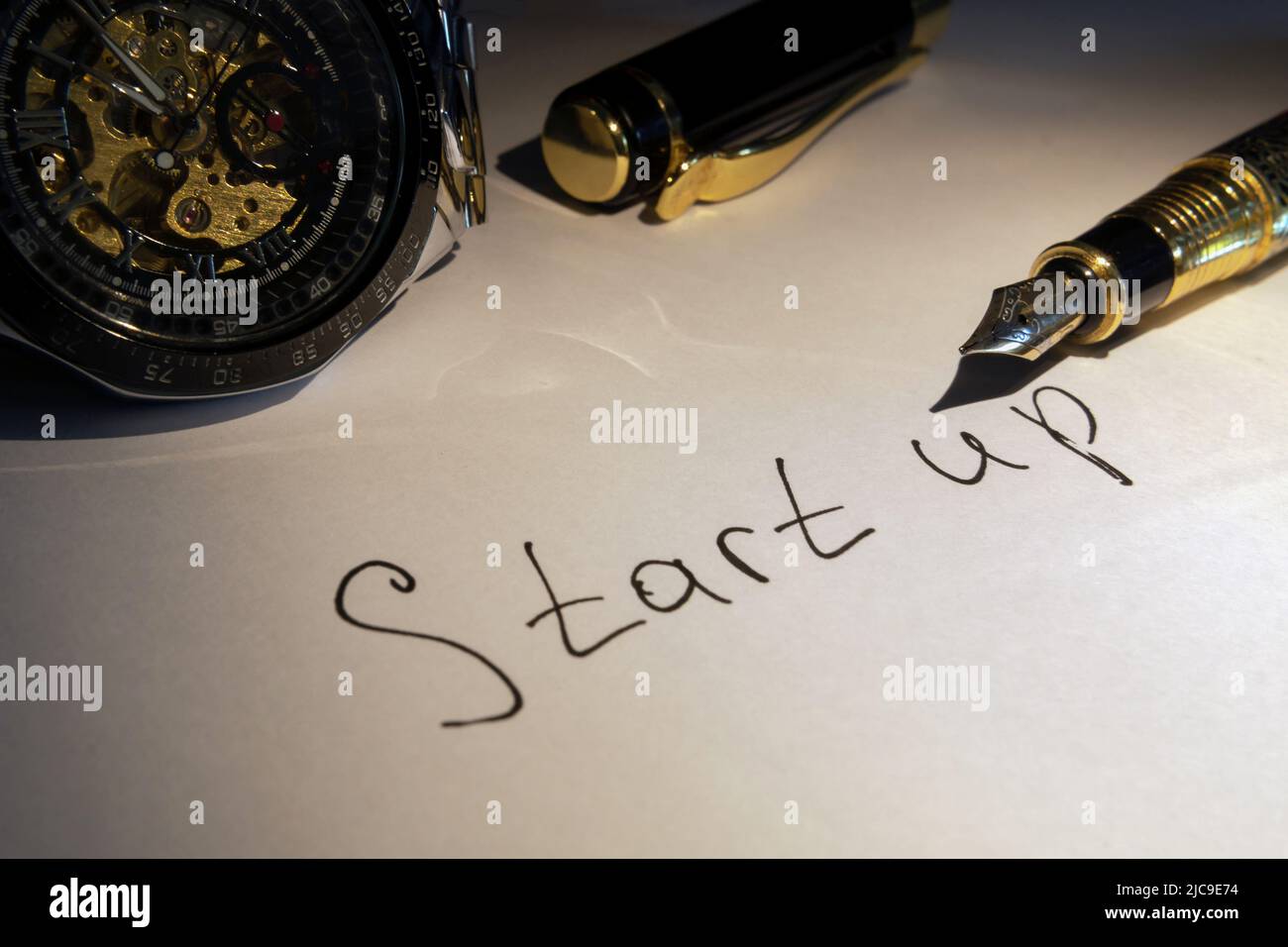 The inscription start up with a fountain pen. Calligraphy. Business ...