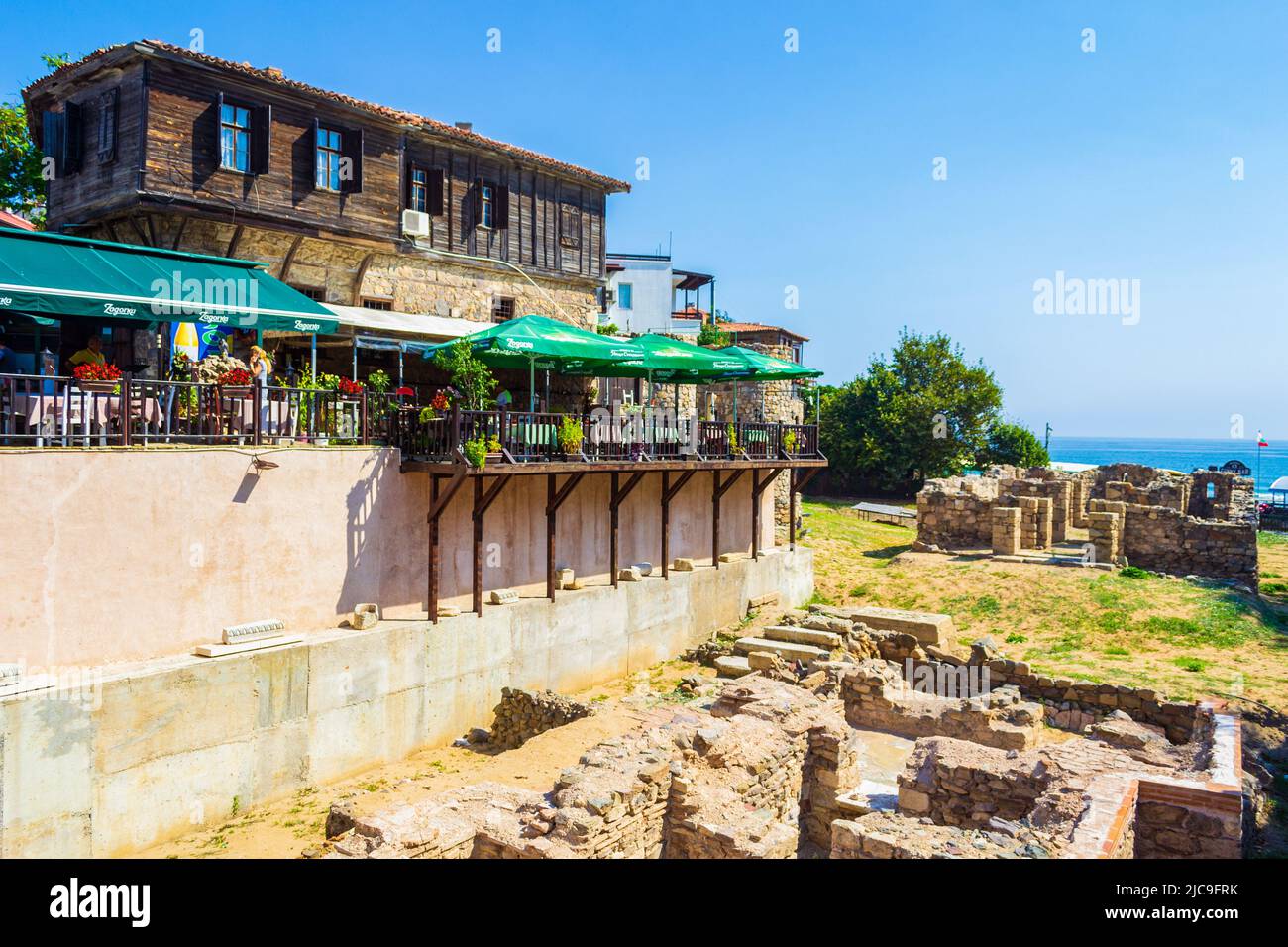 Archaeological site excavations with old city walls and ancient ...