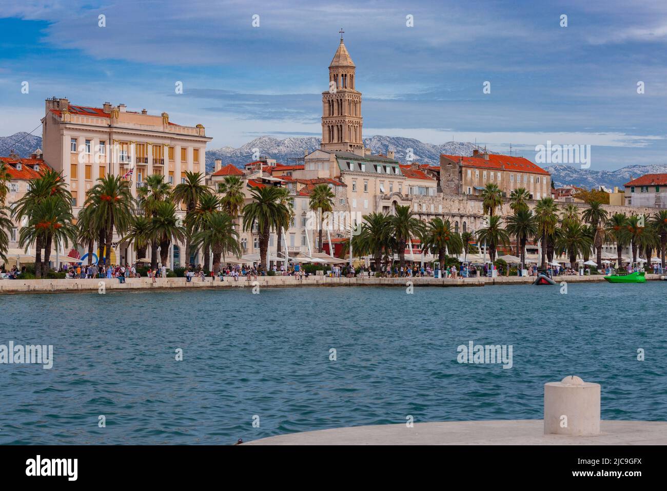 Scenic view of the city promenade and harbor on a sunny day. Split ...
