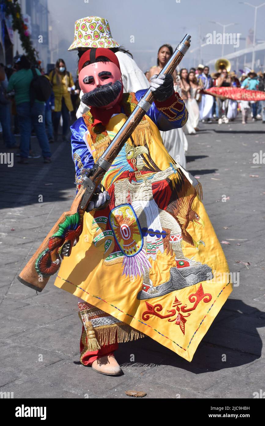 A young participant in the carnaval in Carnaval in Huejotzingo, Puebla ...