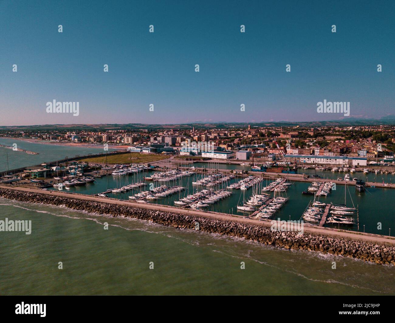 Italy, June 2022; aerial view of Fano with its sea, beaches, port ...