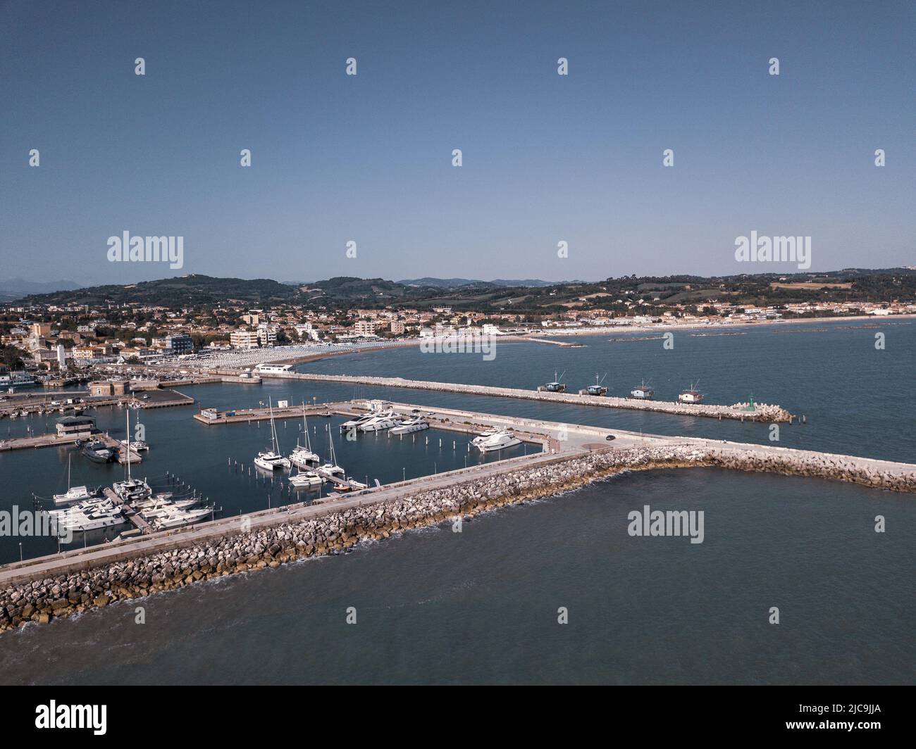 Italy, June 2022; aerial view of Fano with its sea, beaches, port ...