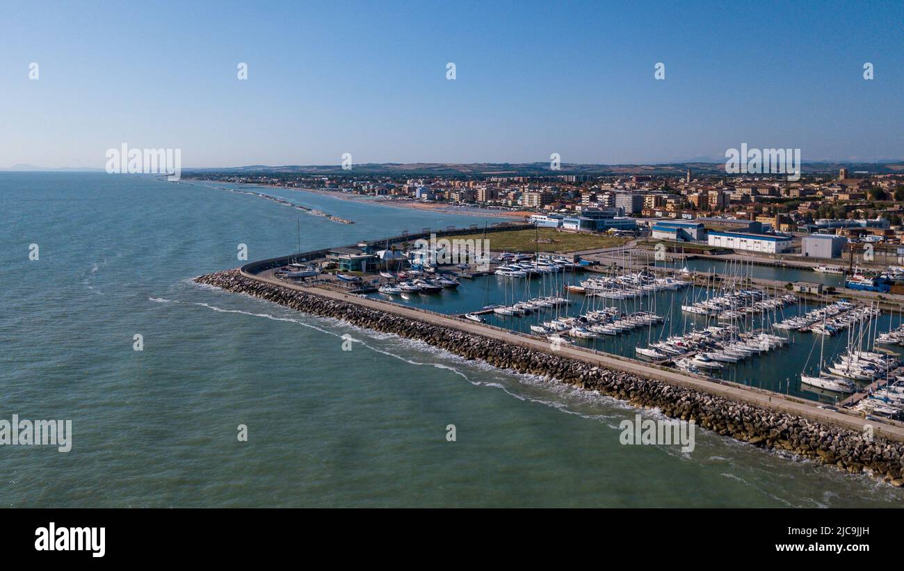 Italy, June 2022; aerial view of Fano with its sea, beaches, port ...