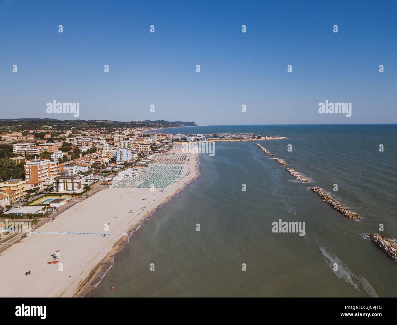 Italy, June 2022; aerial view of Fano with its sea, beaches, port ...