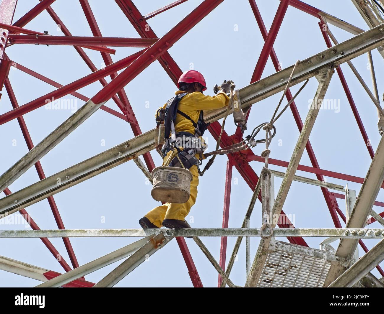 A maintenance worker on a communication tower Stock Photo - Alamy