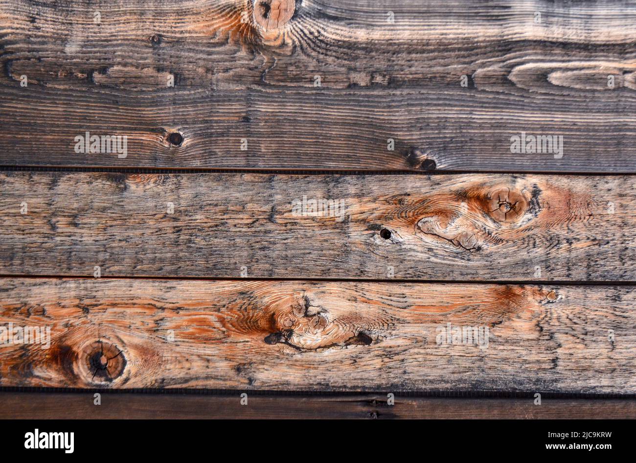 Wooden background, vintage rotten planks that survived on an old 18th ...