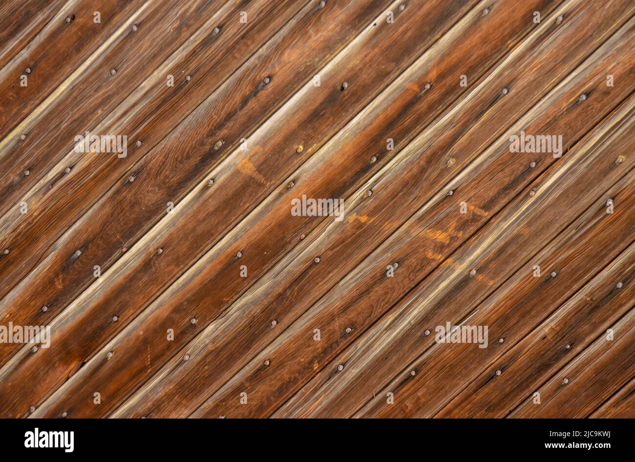 Wooden background, vintage rotten planks that survived on an old 18th ...