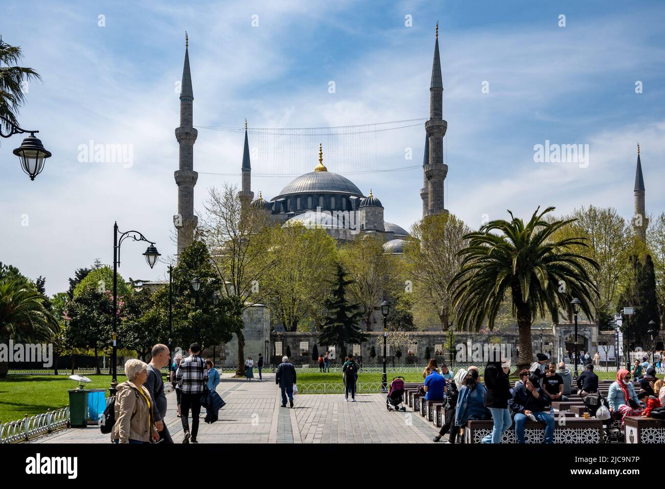 Tourists visiting famed attraction such as the Blue Mosque at ...