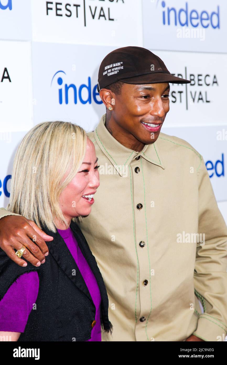 NEW YORK, NY, USA - JUNE 10, 2022: Minya Oh and Pharrell Williams ...