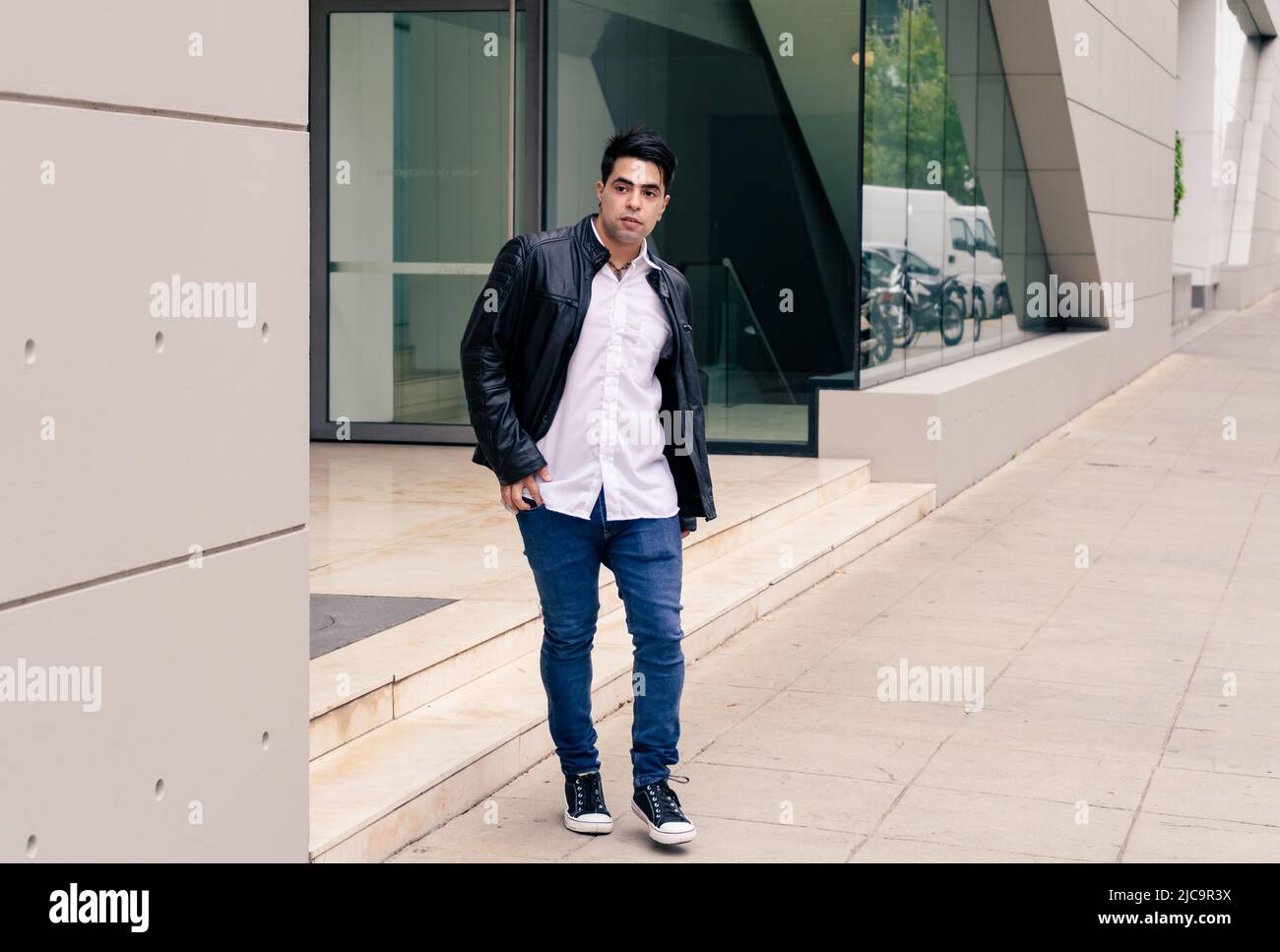 Person observing by the door hi-res stock photography and images - Alamy