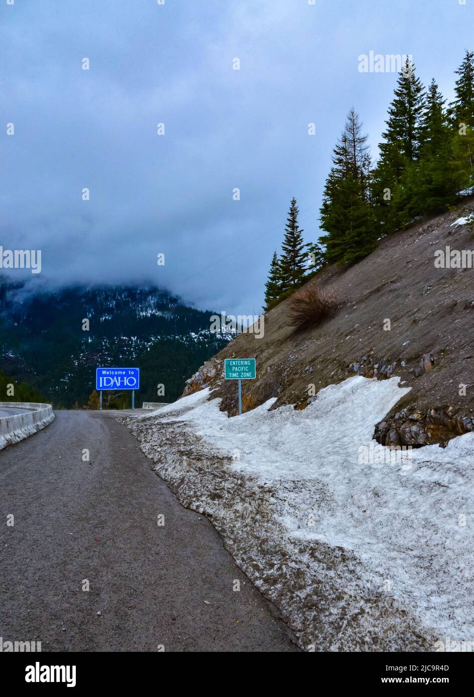 Snowy forest. Information "Welcome to AIDAHO" on the background of ...