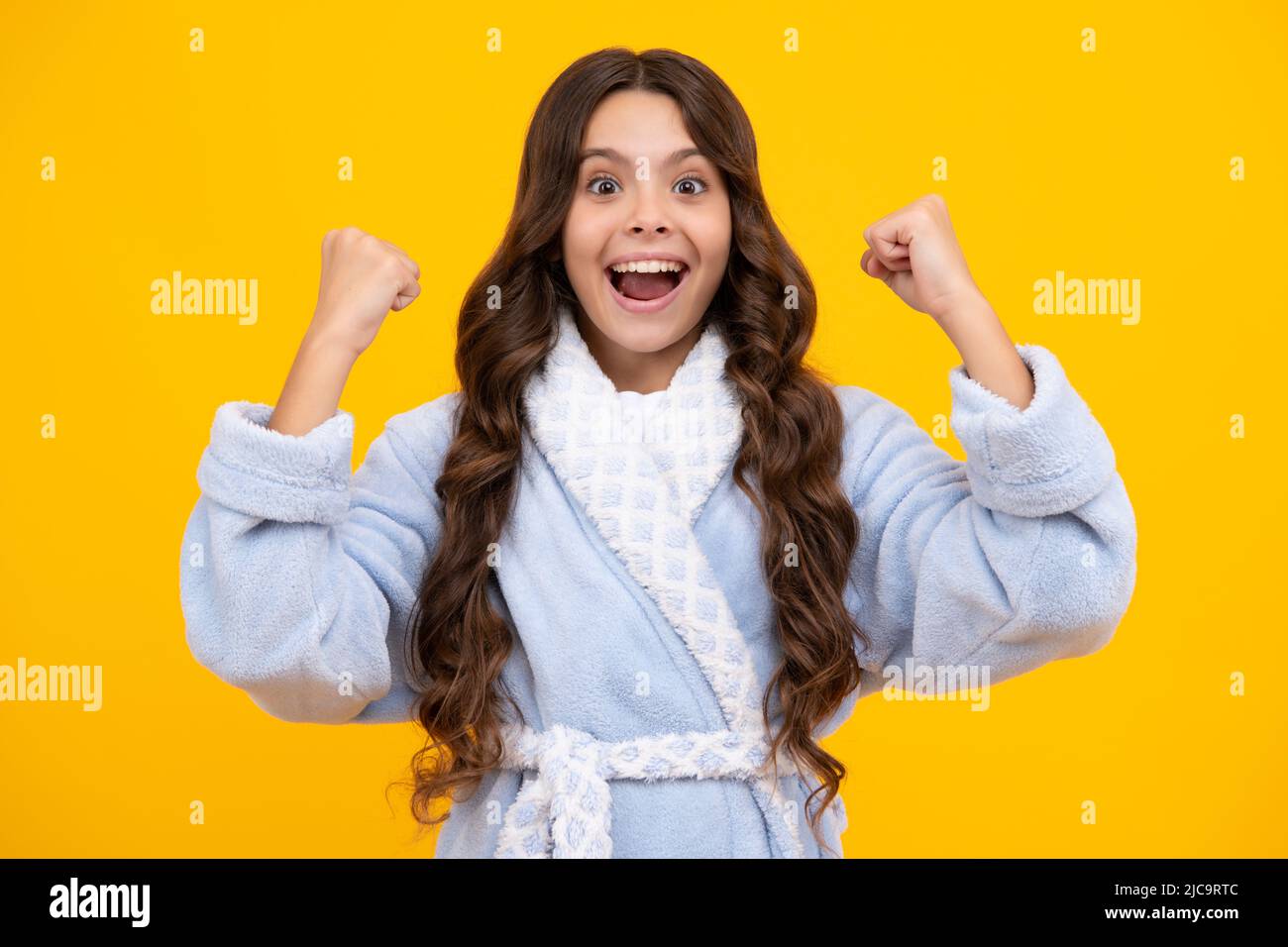 Amazed teen girl. Excited expression, cheerful and glad. Joy, victory ...