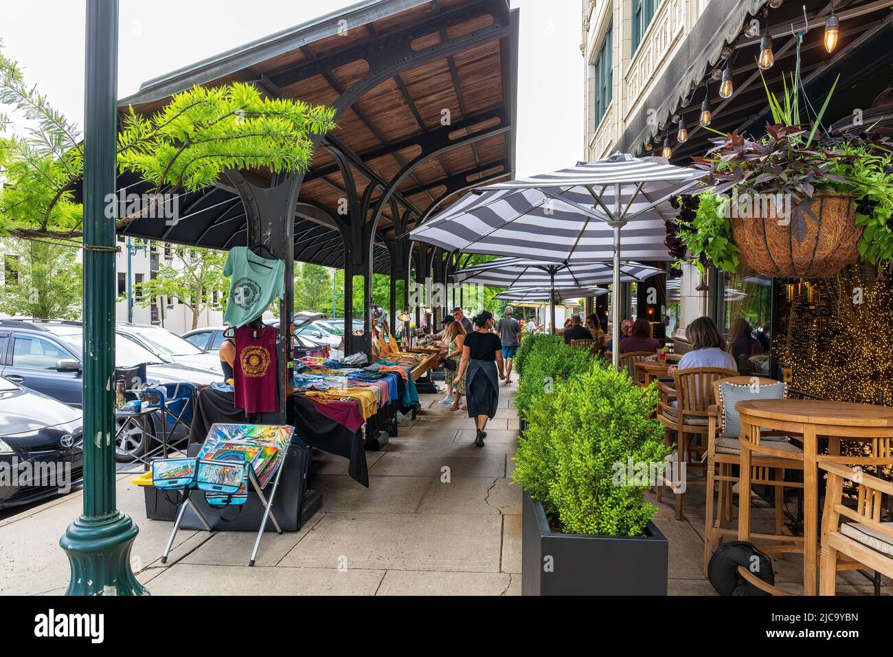 ASHEVILLE, NC, USA-5 JUNE 2022: Vendors on sidewalk at the Grove Arcade ...