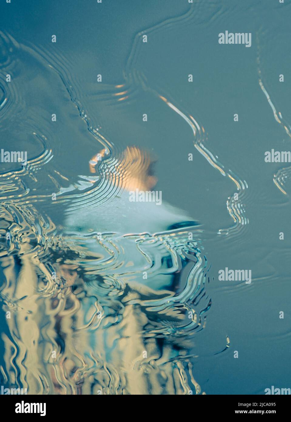 Man's Reflection in water Stock Photo - Alamy