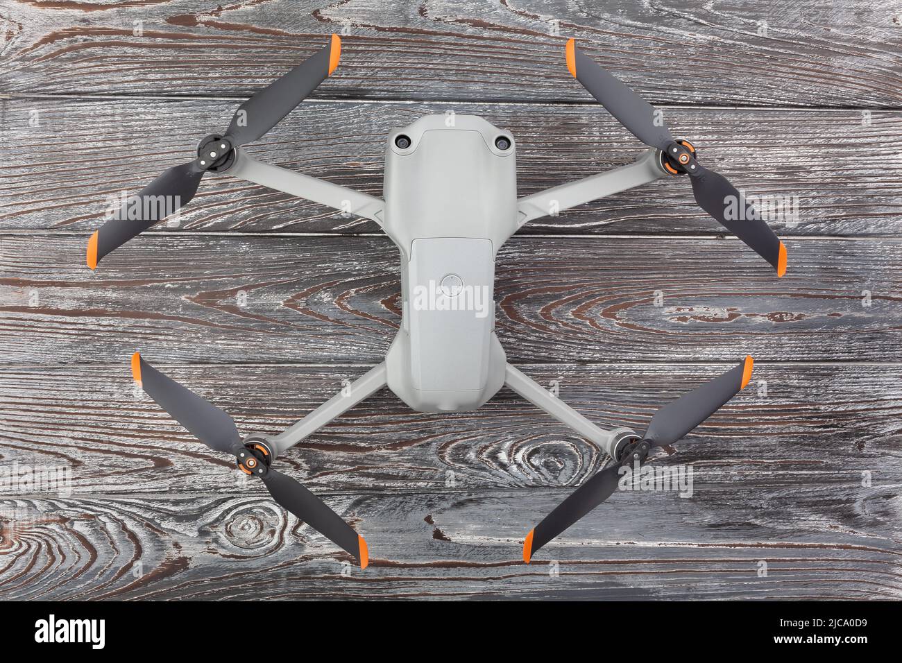 drone on wood background top view Stock Photo - Alamy