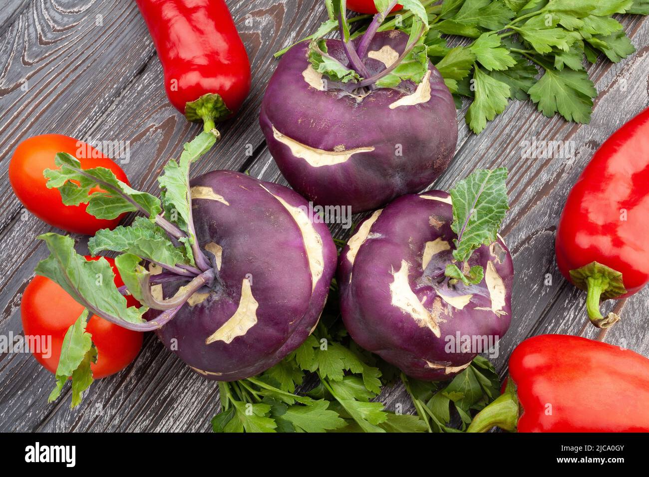 purple kohlrabi on wood background top view Stock Photo - Alamy