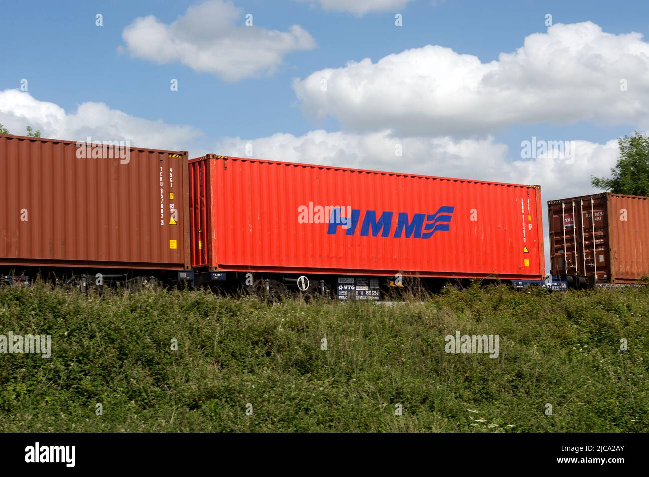 HMM shipping container on a freightliner train, Warwickshire, UK Stock ...