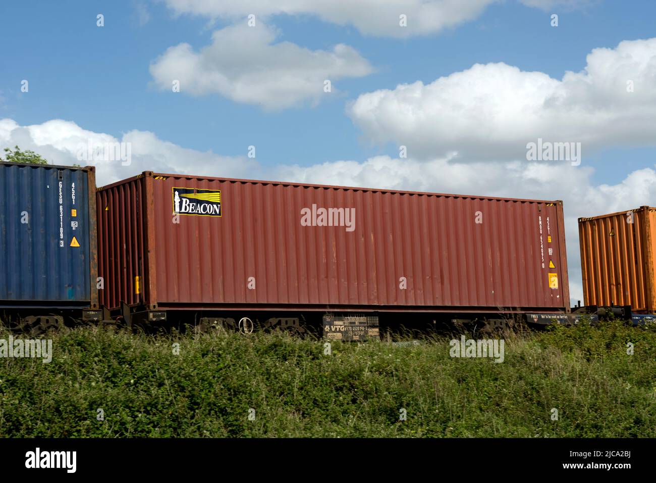 Beacon shipping container on a freightliner train, Warwickshire, UK ...
