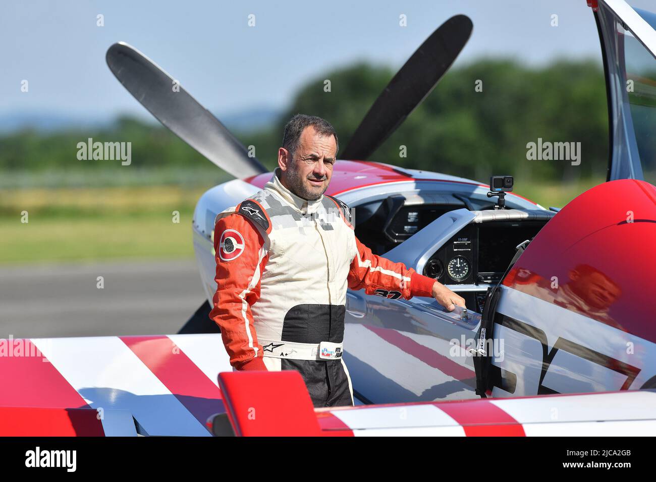 Peter Podlunsek, an experienced Red Bull acrobatic pilot, flew over ...