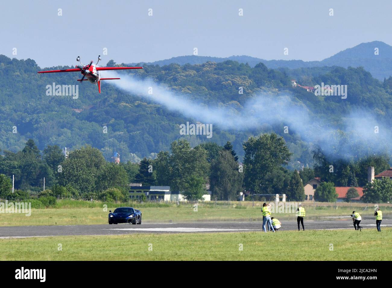 Peter Podlunsek, an experienced Red Bull acrobatic pilot, flew over ...