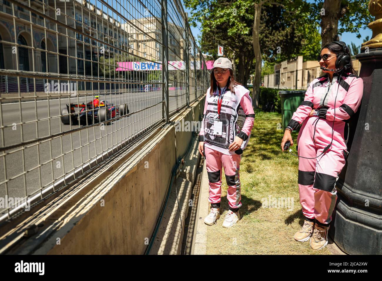 The women only marshals post alongside the track during the 6th round ...
