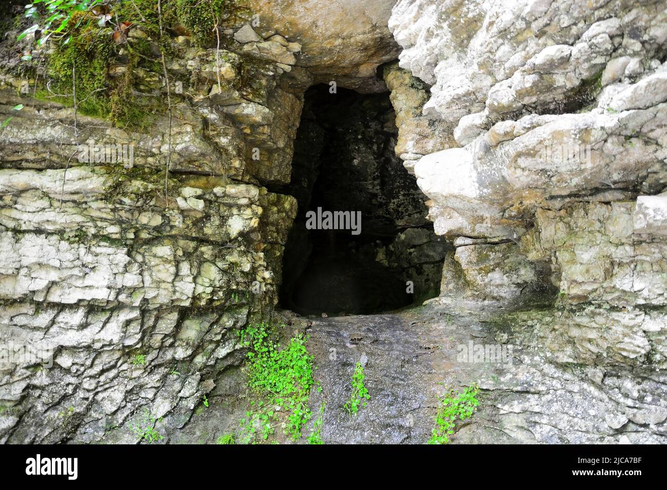 Entrance to the cave- closeup view Stock Photo - Alamy