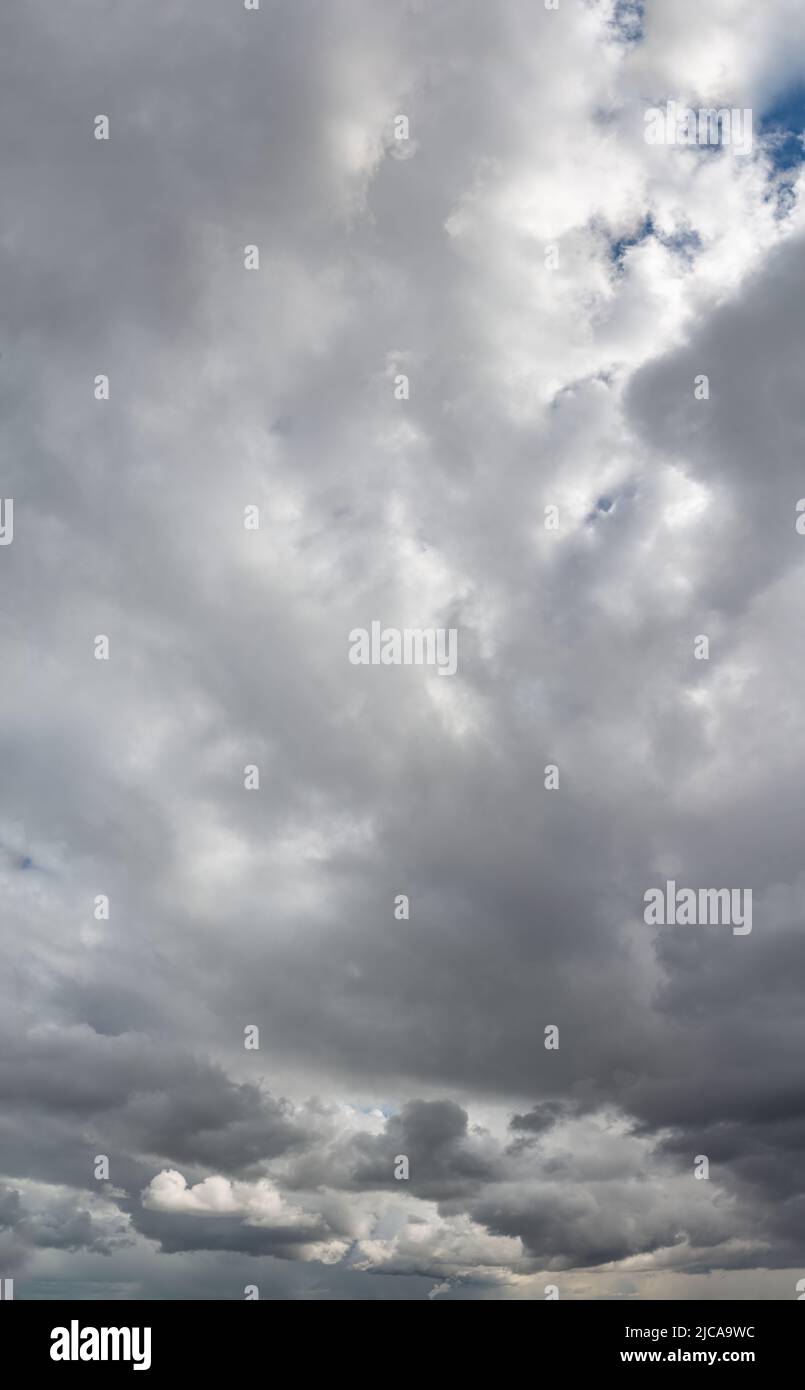 Fantastic soft thunderclouds, natural sky composition, vertical ...