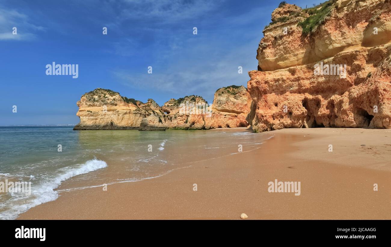 Seastack and cliffs at the westernmost end of Praia da Prainha Beach ...