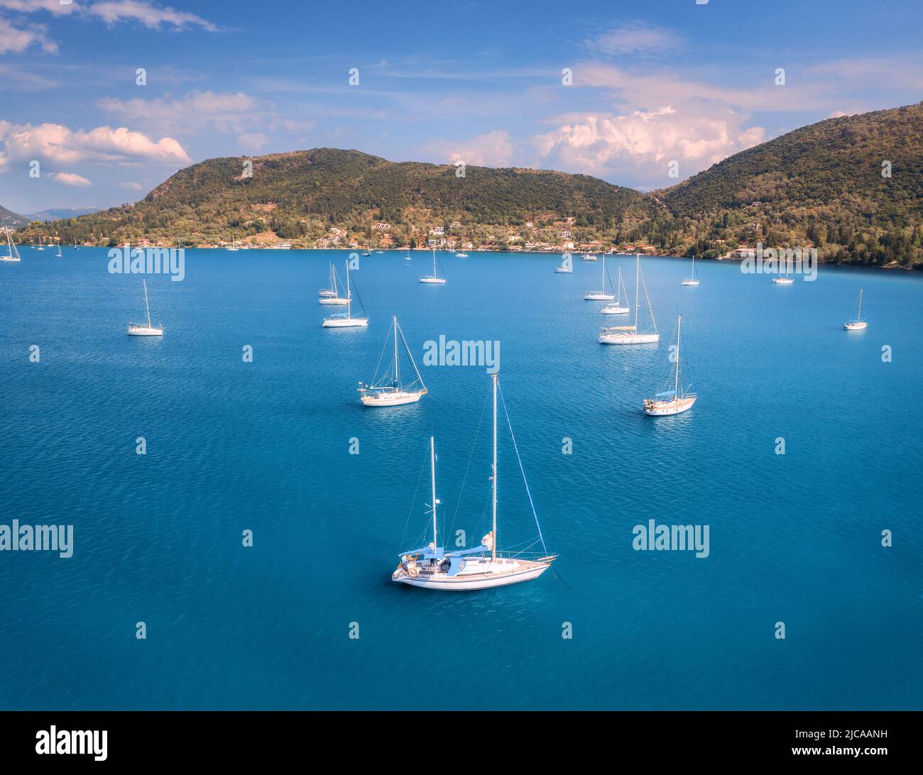 Aerial view of beautiful yacht. Boat on the sea at sunset Stock Photo ...