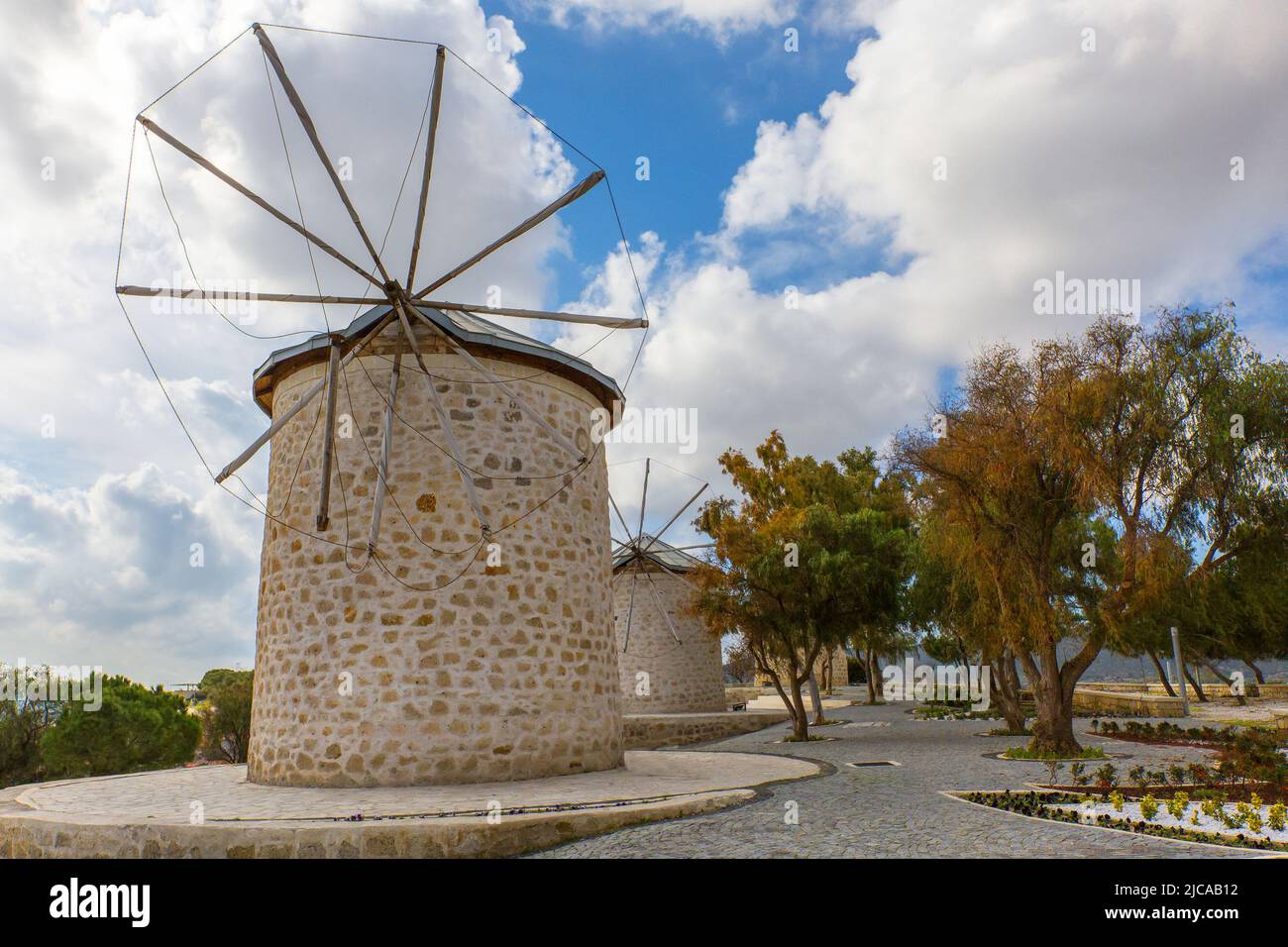 Ancient windmill in the town of Alacati in Izmir, Turkey Stock Photo ...