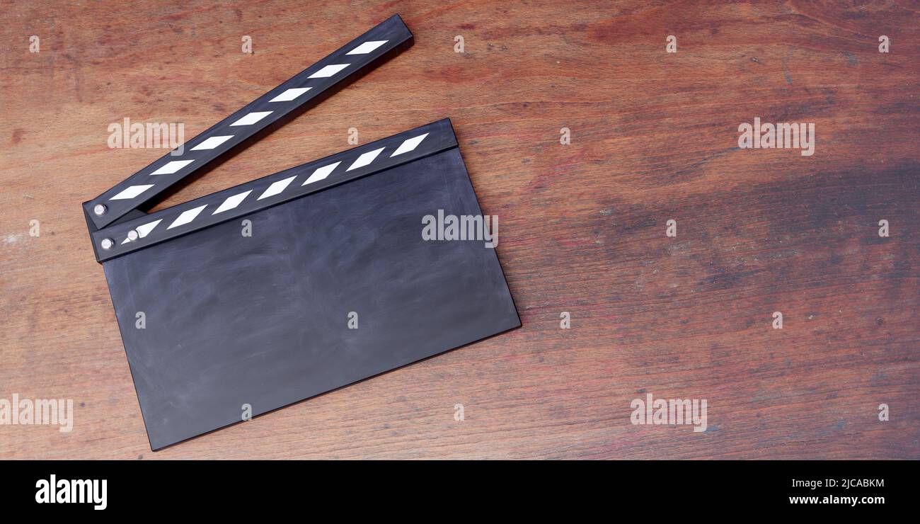 Movie clapper, blank empty cinema scene clapperboard on wooden ...