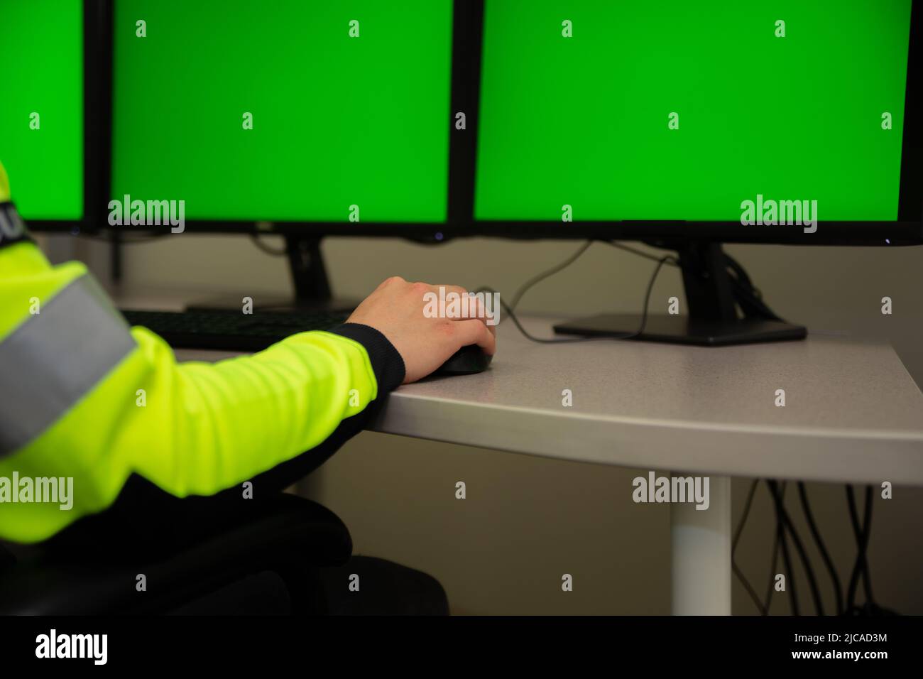 Security team watching over CCTV surveillance monitors Stock Photo - Alamy